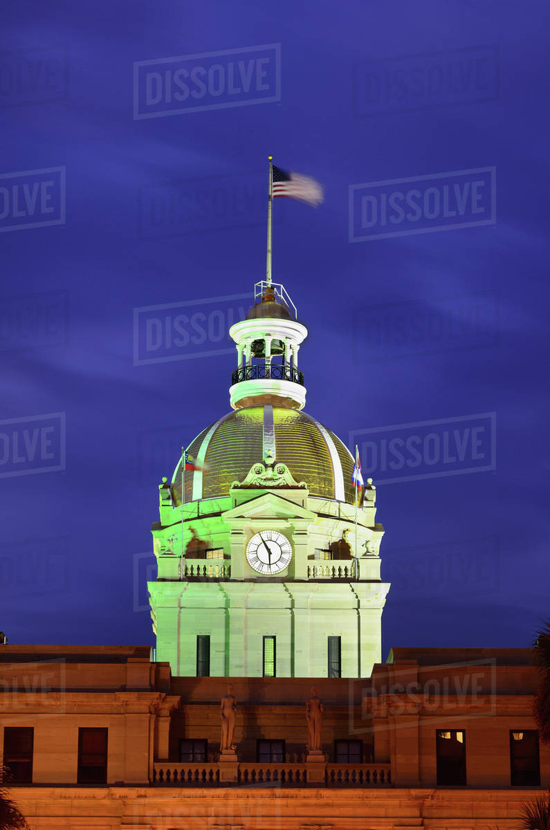 City hall clock tower illuminated in green - Royalty-free Stock Photo ...