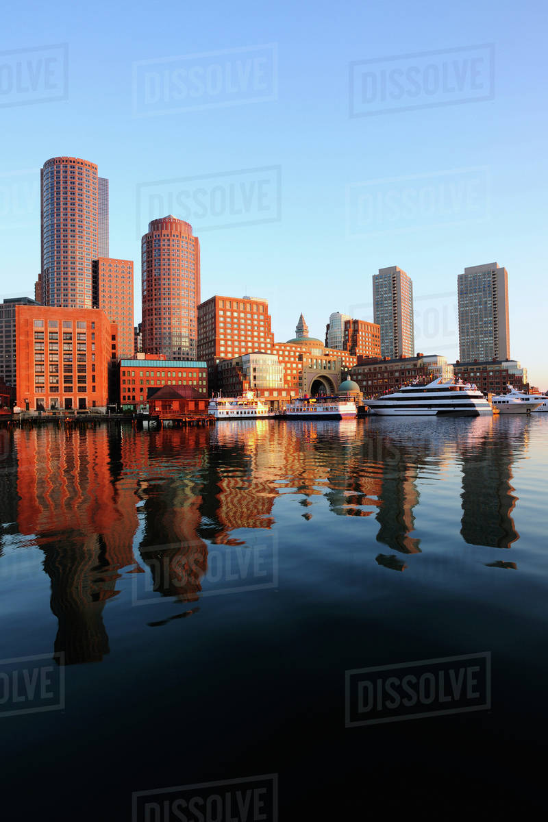Symmetrical view of architecture reflecting in water - Royalty-free ...
