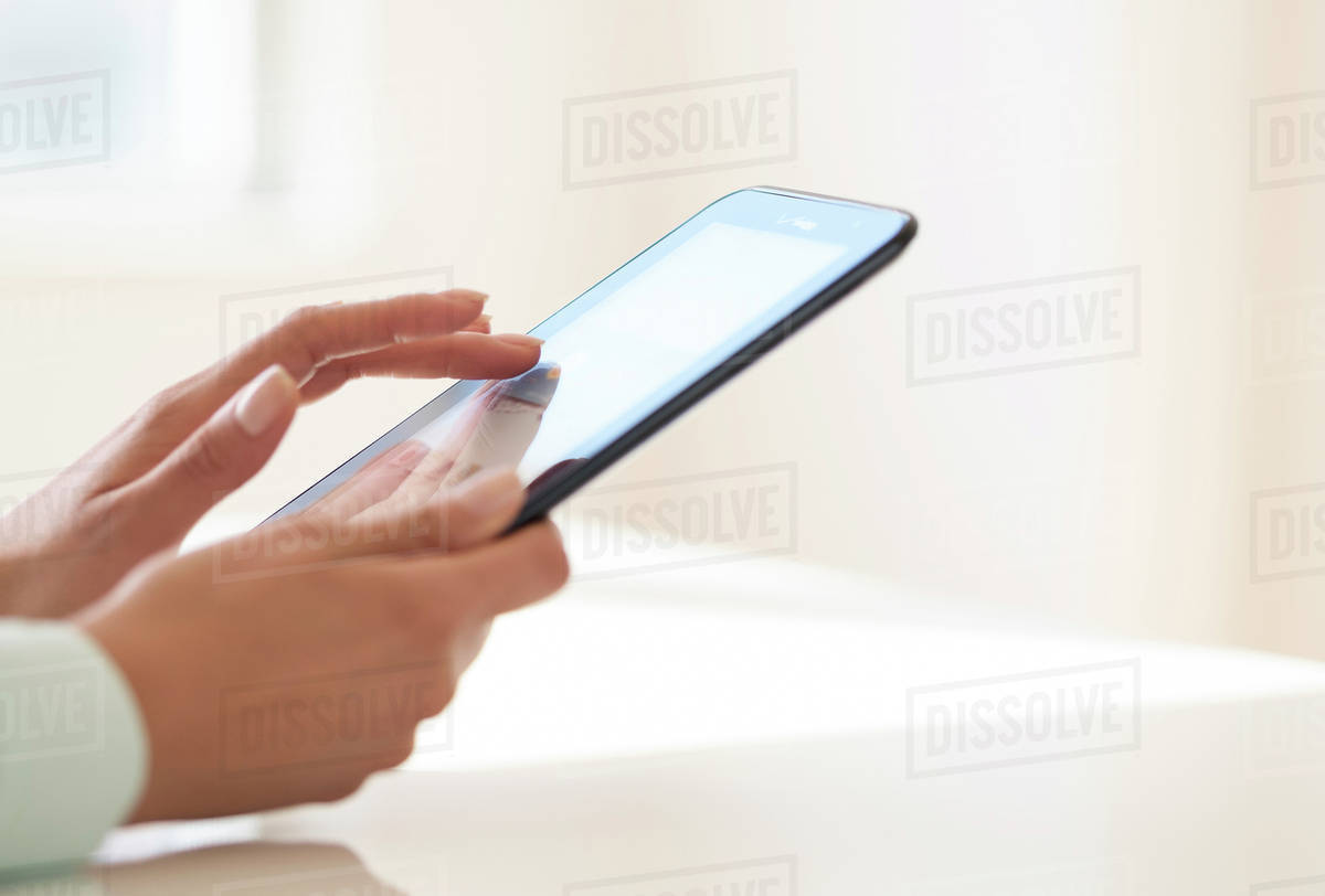 Hands using tablet pc - Royalty-free Stock Photo | Dissolve