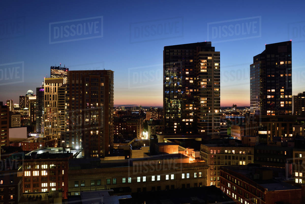Dusk lights over cityscape - Royalty-free Stock Photo | Dissolve