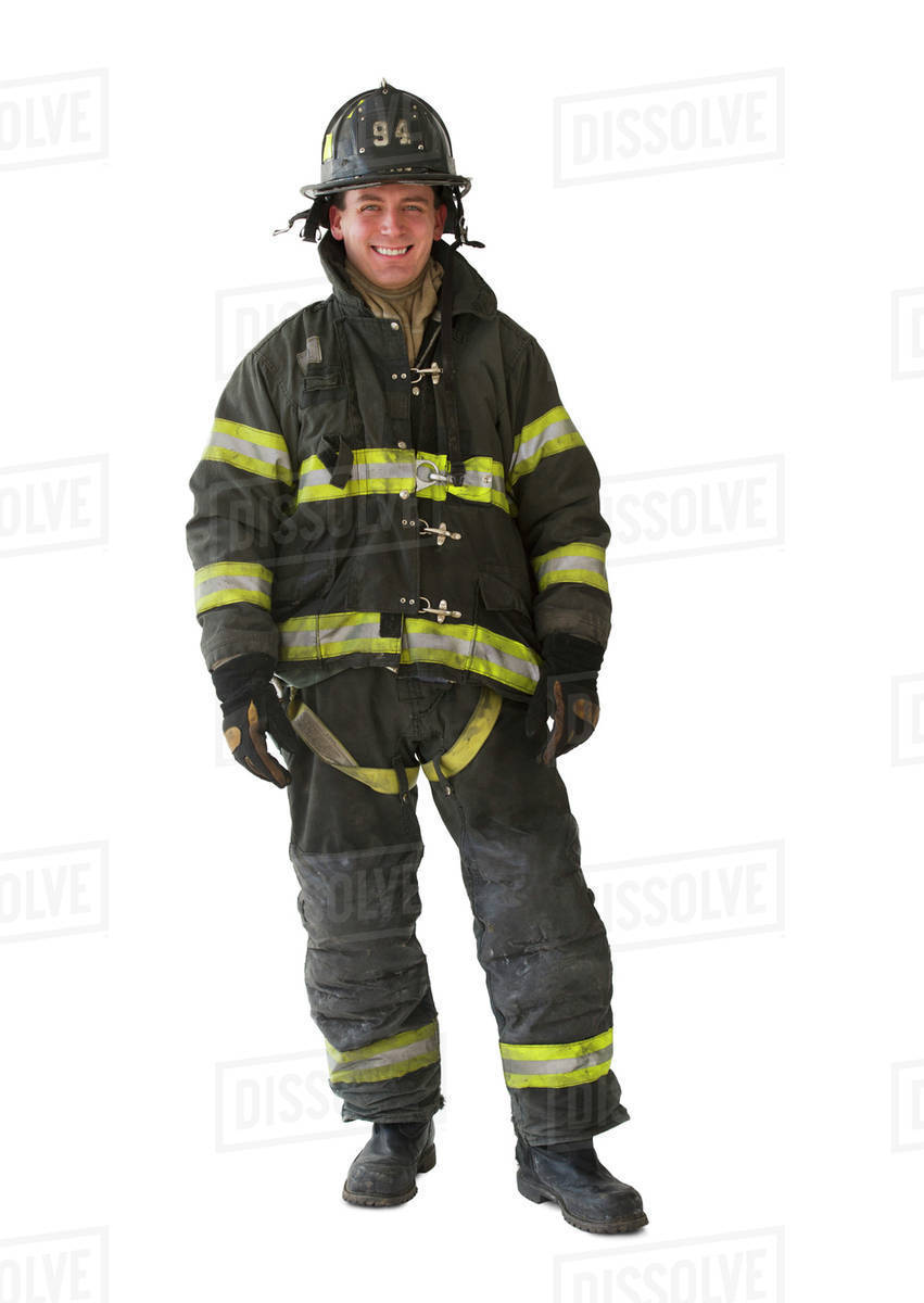 Studio portrait of firefighter - Stock Photo - Dissolve