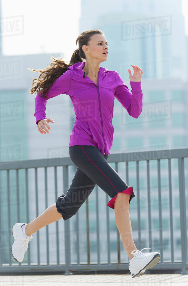 Woman running - Royalty-free Stock Photo | Dissolve