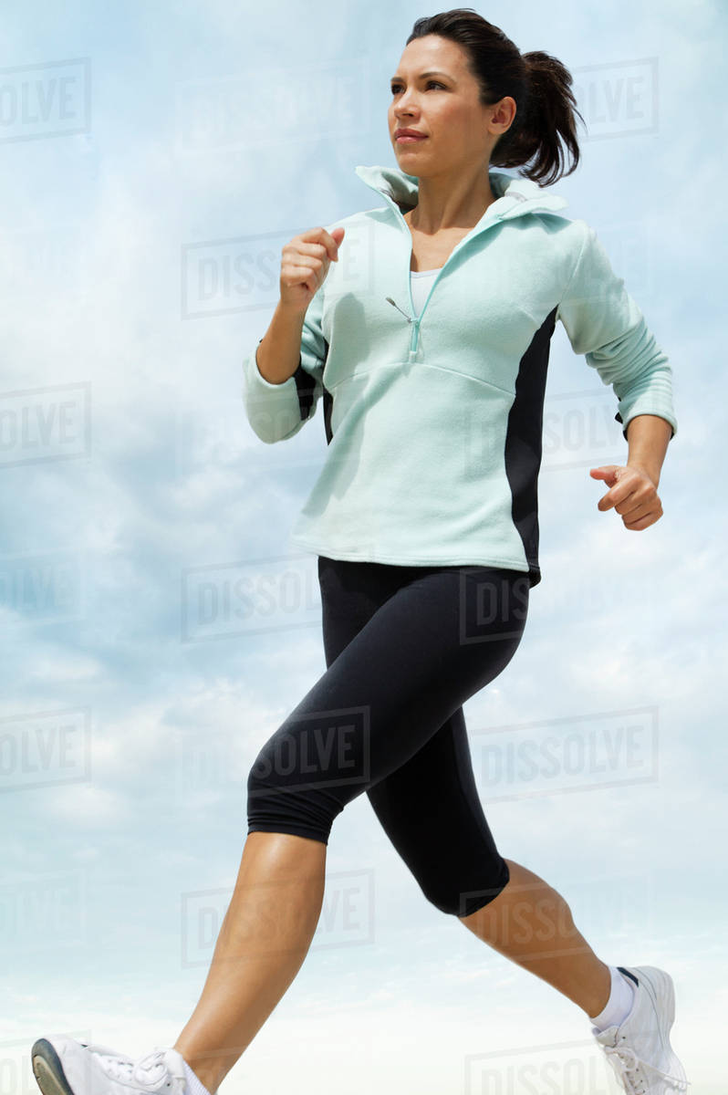 Woman jogging - Royalty-free Stock Photo | Dissolve