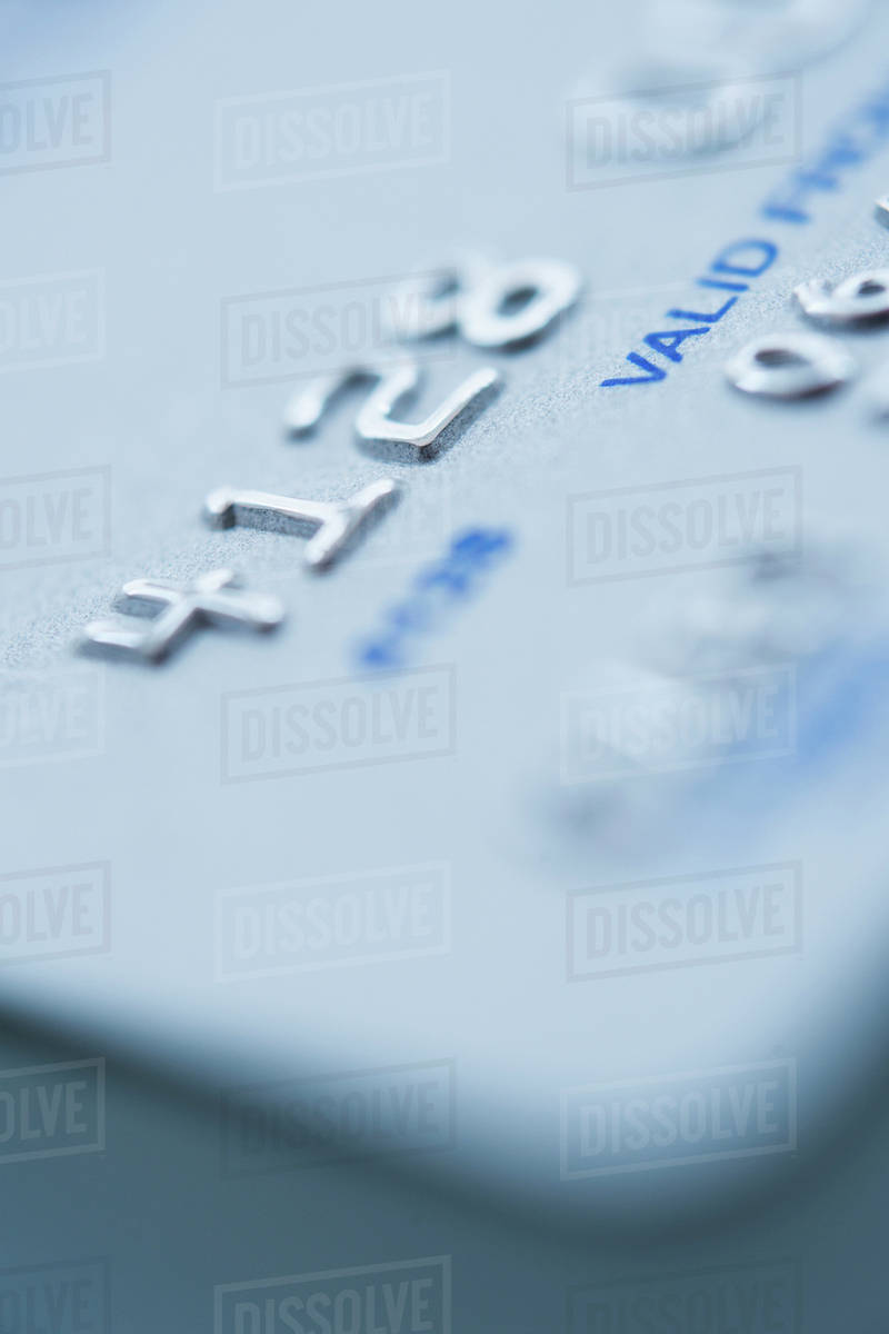 Detail of credit card, studio shot - Royalty-free Stock Photo | Dissolve