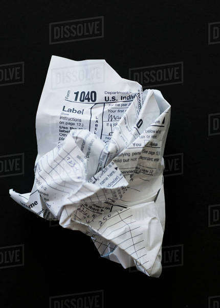 Studio shot of crumpled document - Royalty-free Stock Photo | Dissolve