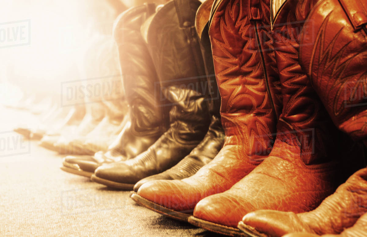 Row of cowboy boots - Royalty-free Stock Photo | Dissolve