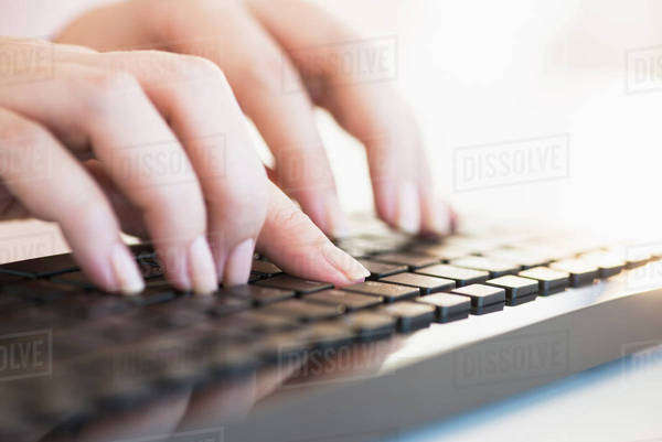 Close up of woman's hands typing on computer keyboard - Royalty-free ...