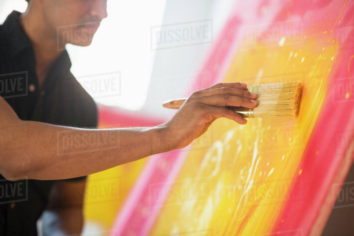 Man painting in studio - Royalty-free Stock Photo | Dissolve