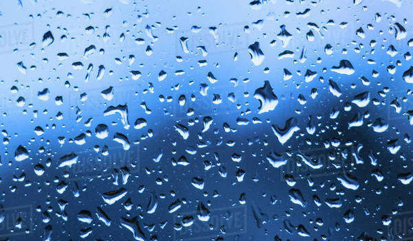 Droplets on window - Stock Photo - Dissolve