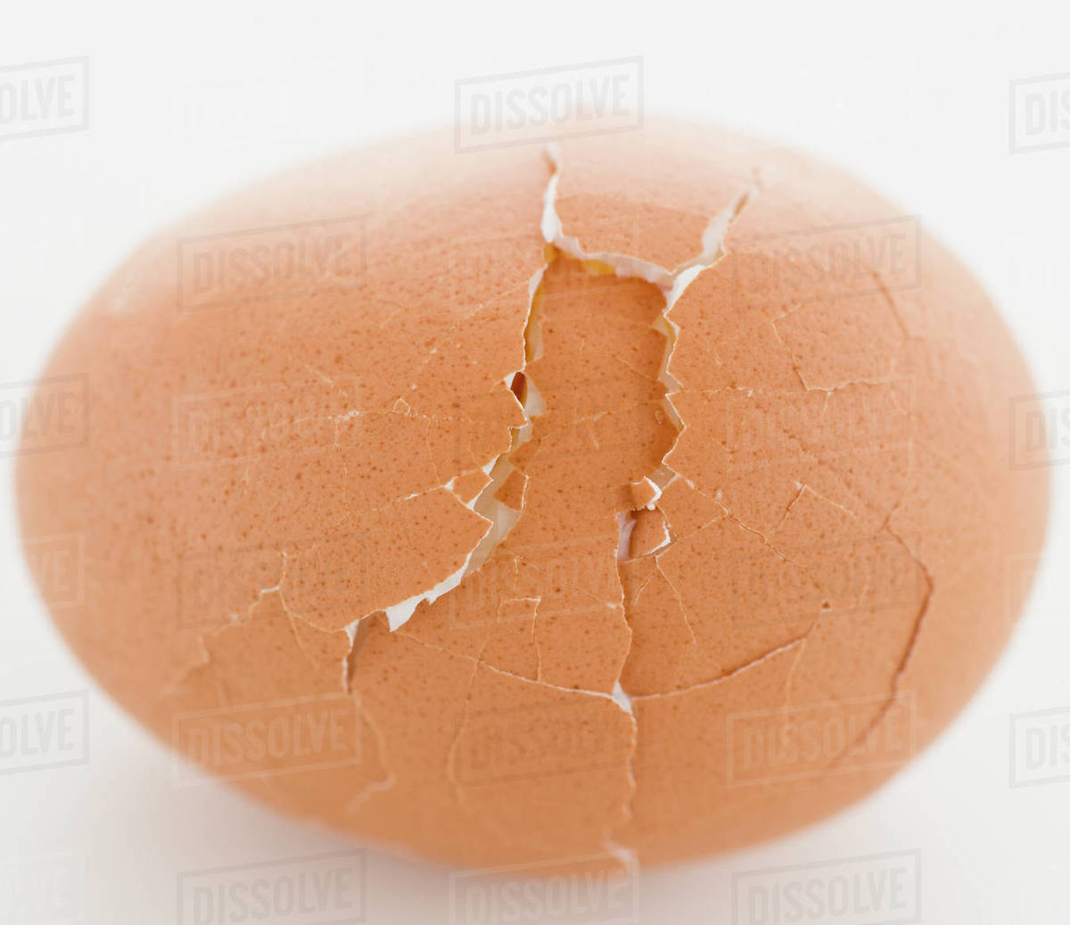 Close up of egg with cracked shell, studio shot - Royalty-free Stock ...
