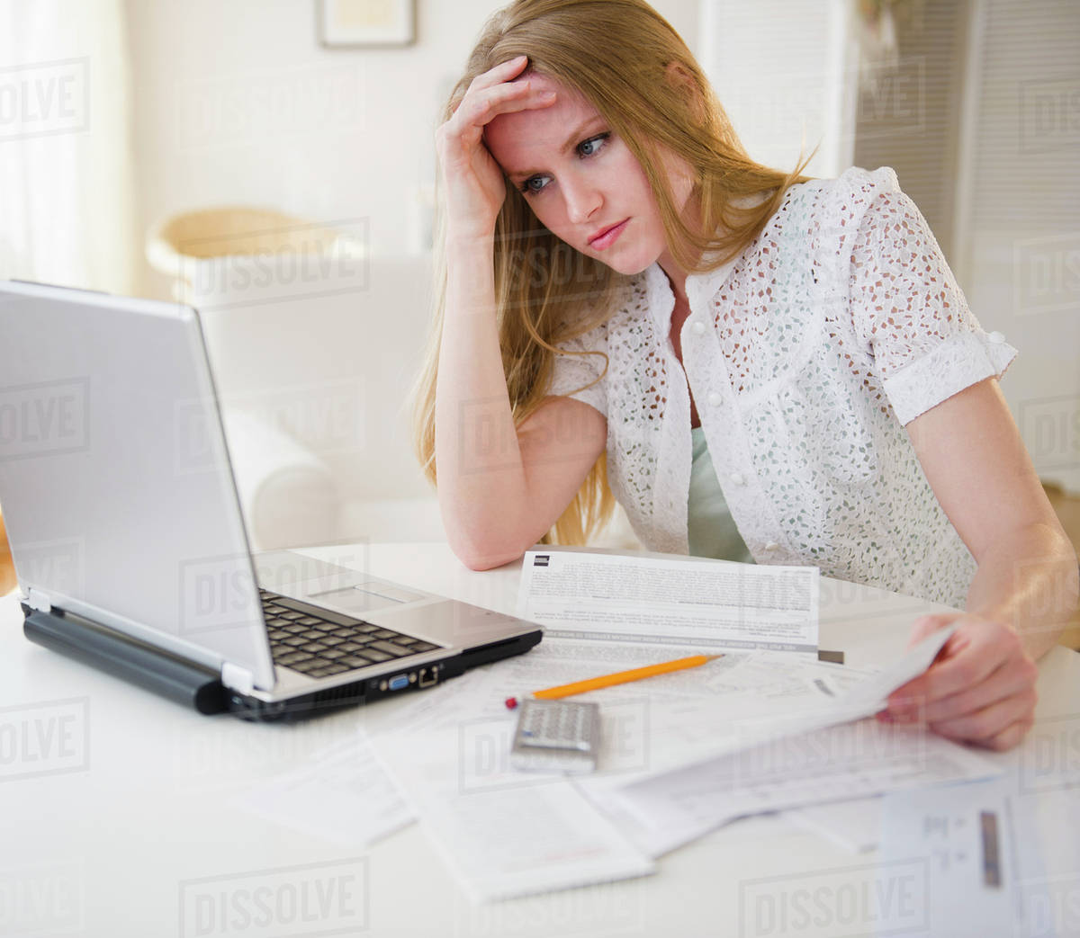 Woman doing paperwork - Stock Photo - Dissolve