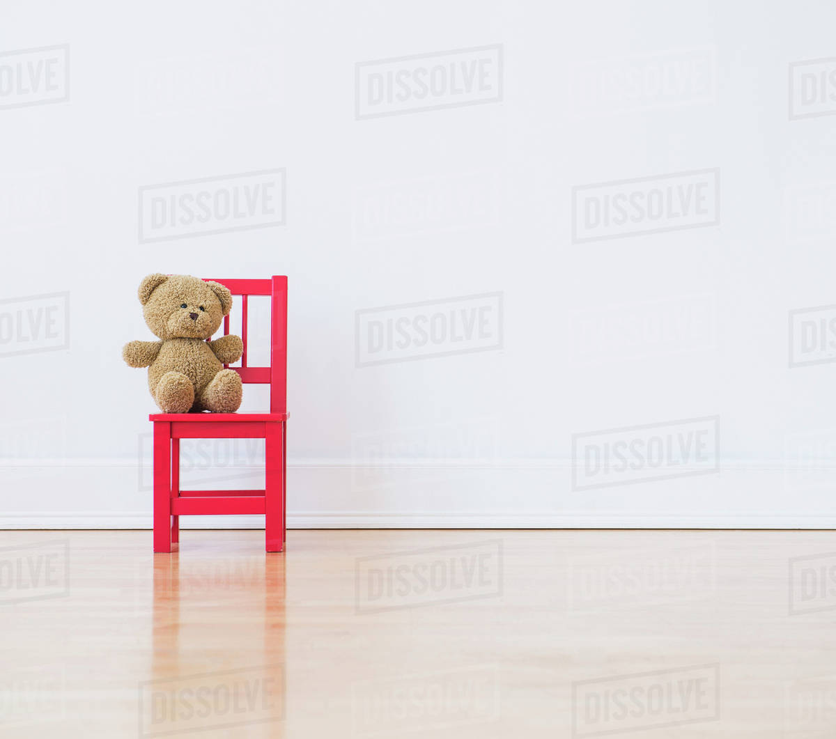 Studio shot of teddy bear sitting on red chair - Royalty-free Stock ...