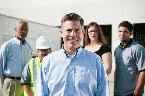 Portrait of warehouse workers and manager - Royalty-free Stock Photo ...