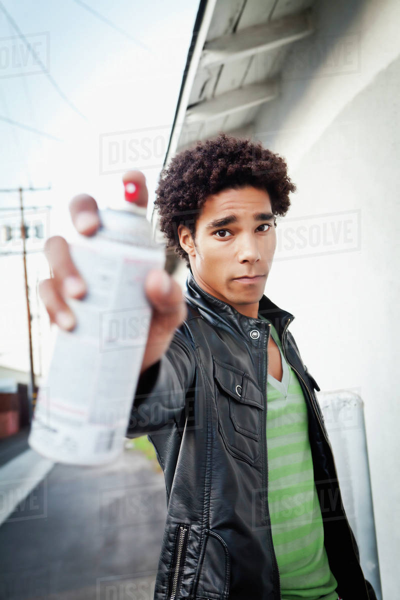 Portrait Of Man Holding Spray Paint Royalty free Stock Photo Dissolve