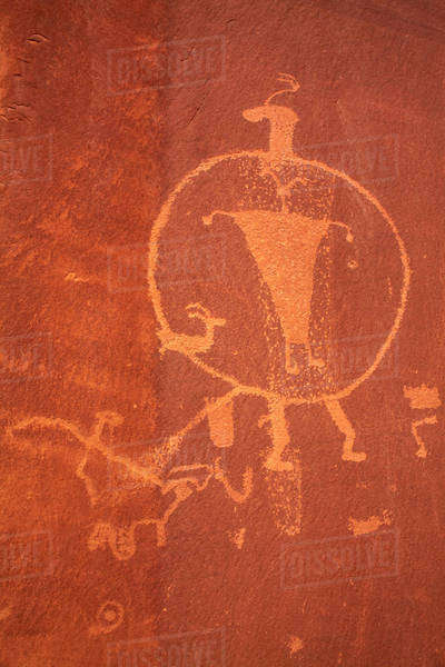 USA, Utah, Native American art on stone wall - Stock Photo - Dissolve