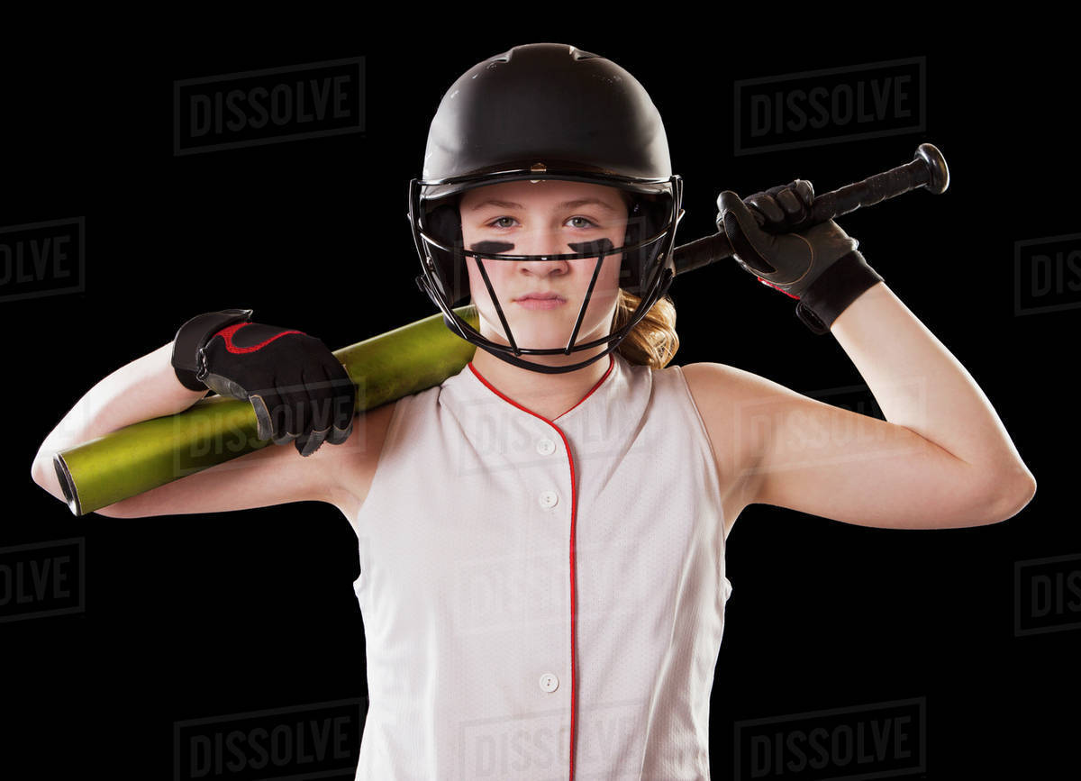 Portrait of girl (12-13) plying softball, studio shot - Stock Photo ...