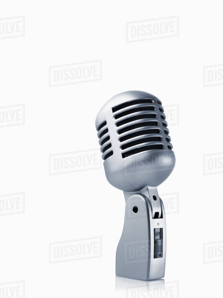 Studio shot of vintage-themed modern microphone on white background ...