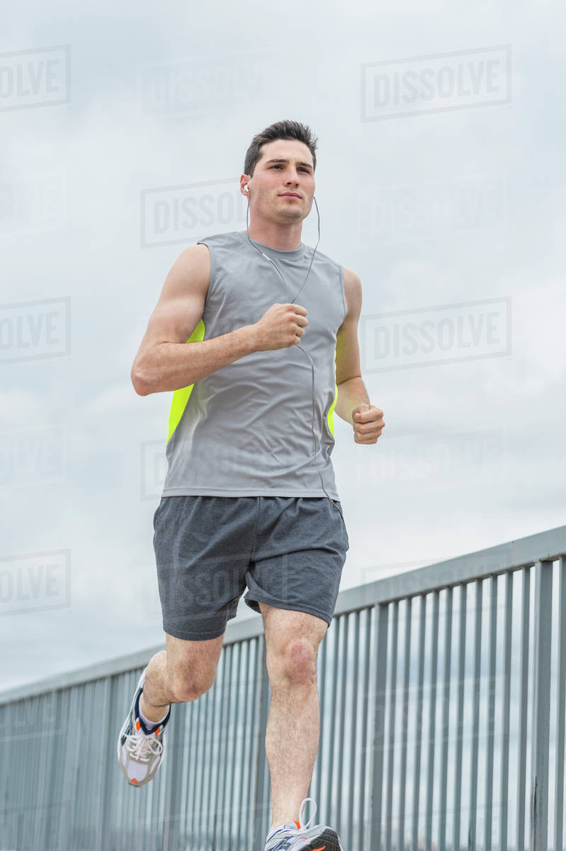 Man jogging - Stock Photo - Dissolve