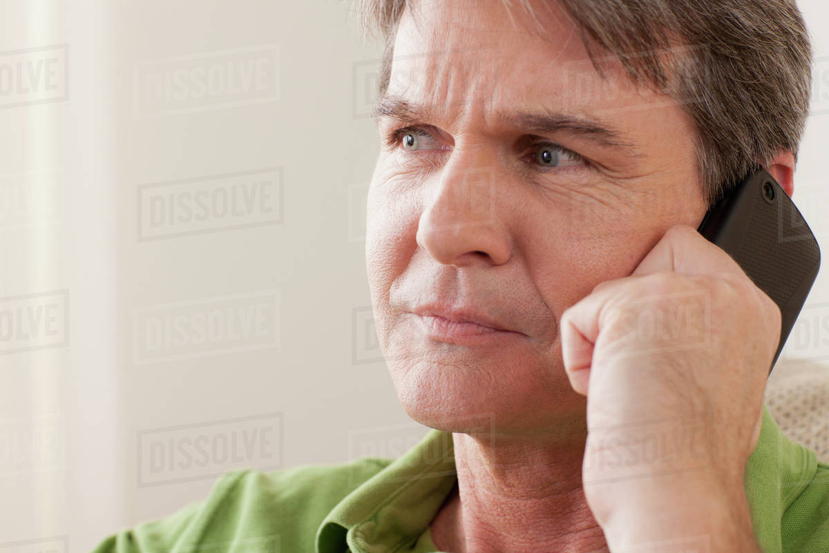 Man talking on phone - Royalty-free Stock Photo | Dissolve