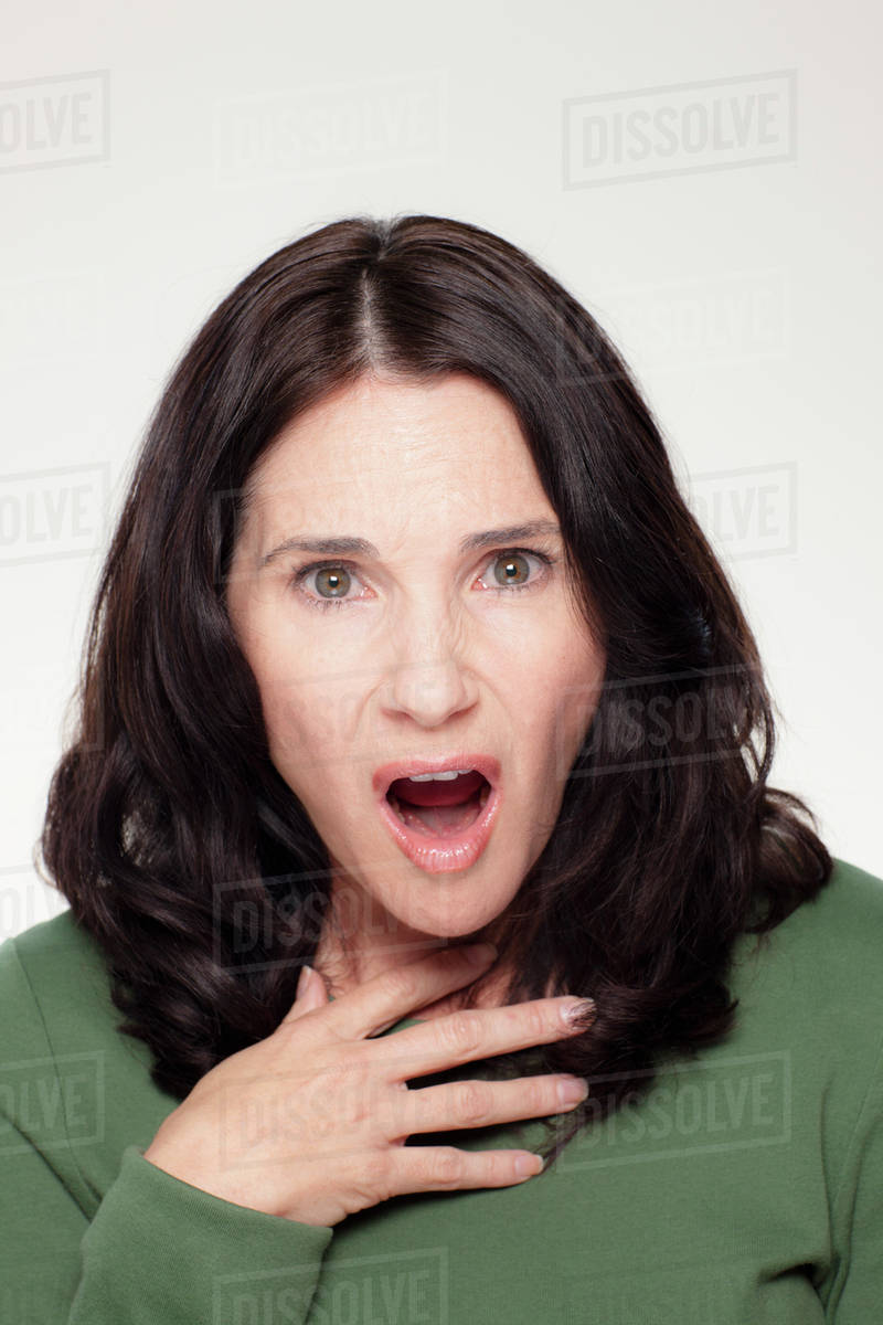 Studio portrait of mature woman with facial expression - Royalty-free ...