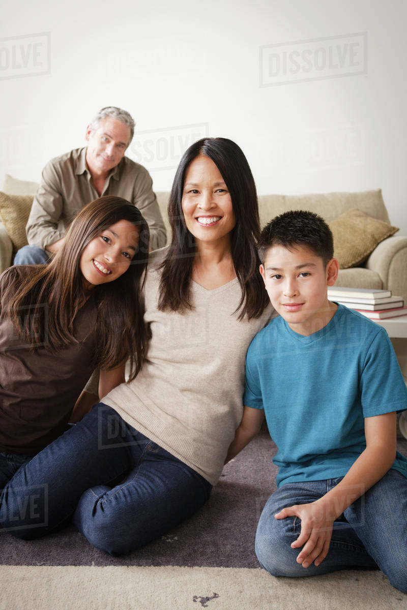 Portrait of cheerful family - Stock Photo - Dissolve