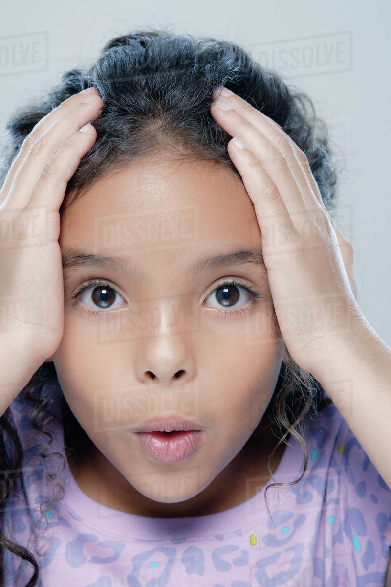 Portrait of girl (6-7), studio shot - Royalty-free Stock Photo | Dissolve