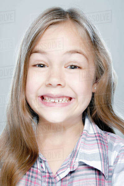 Portrait of girl (6-7), studio shot - Royalty-free Stock Photo | Dissolve