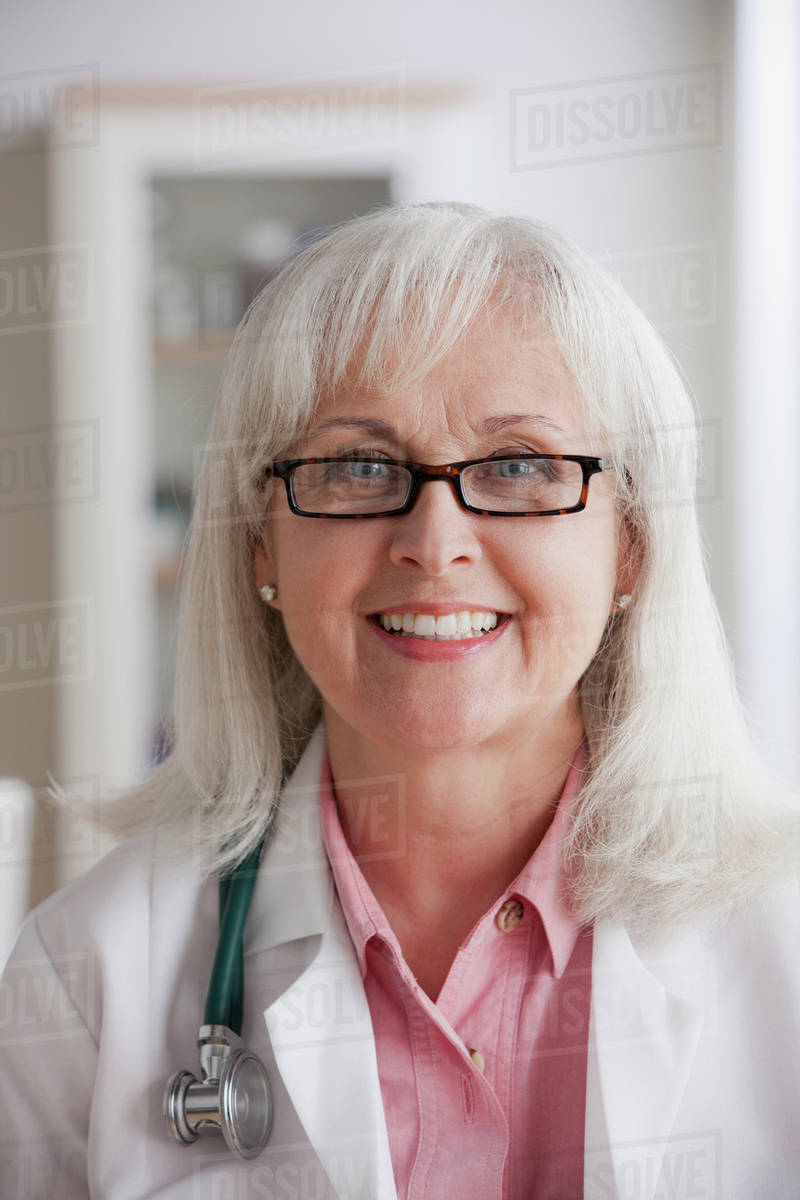 Portrait of senior doctor - Stock Photo - Dissolve