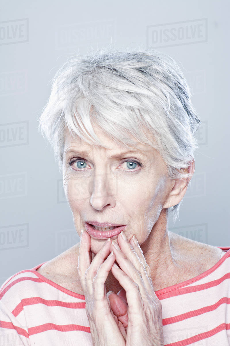 Portrait of worried senior woman, studio shot - Royalty-free Stock ...