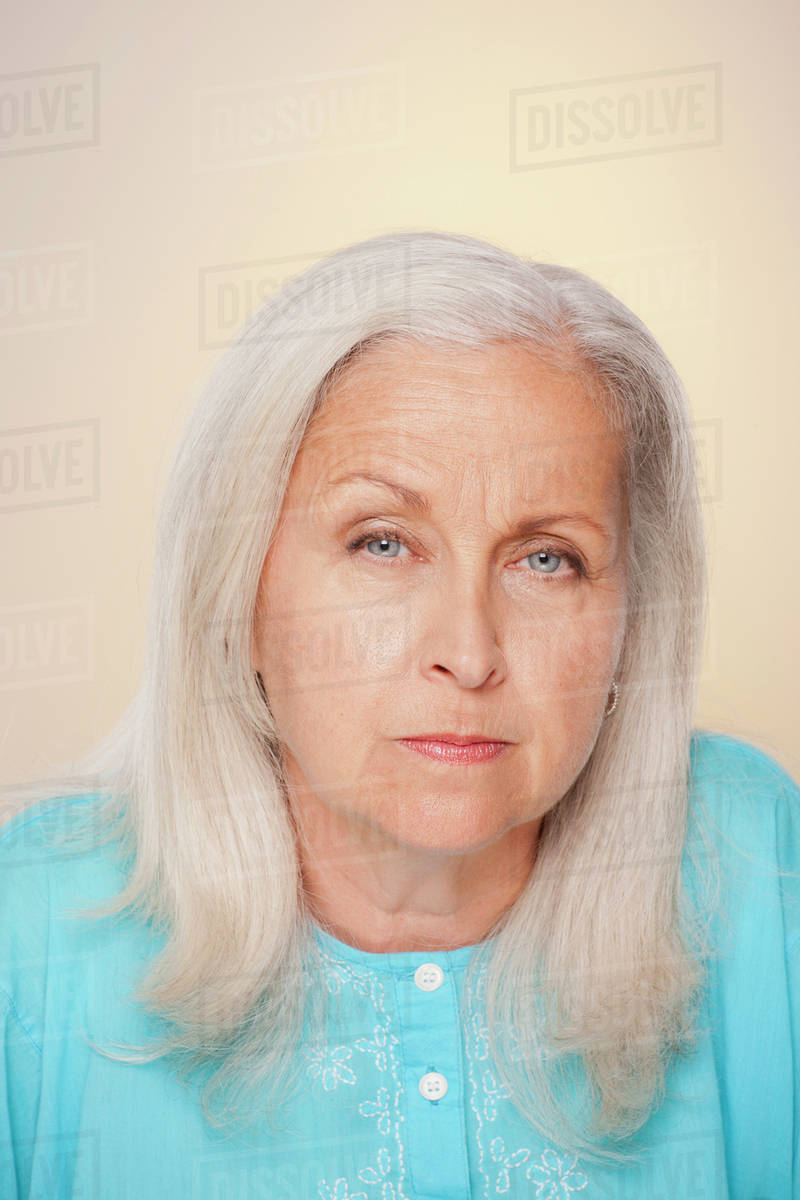 Portrait of senior woman with suspicious face expression - Royalty-free ...
