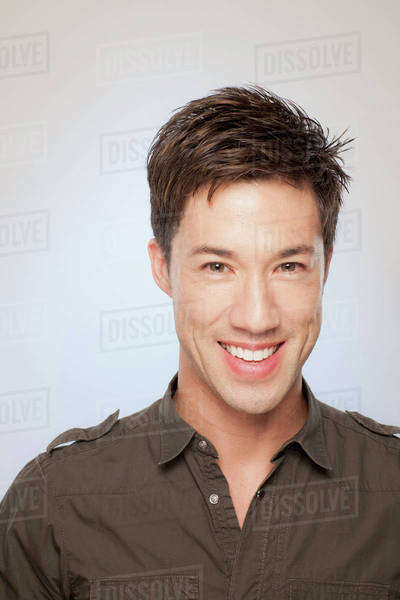 Portrait of smiling man - Royalty-free Stock Photo | Dissolve