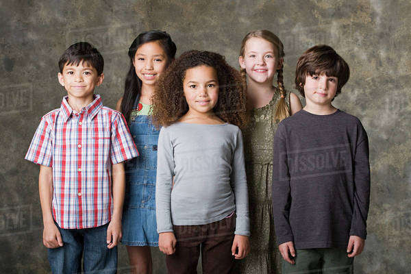 Children (6-7, 8-9) posing together, studio shot - Royalty-free Stock ...