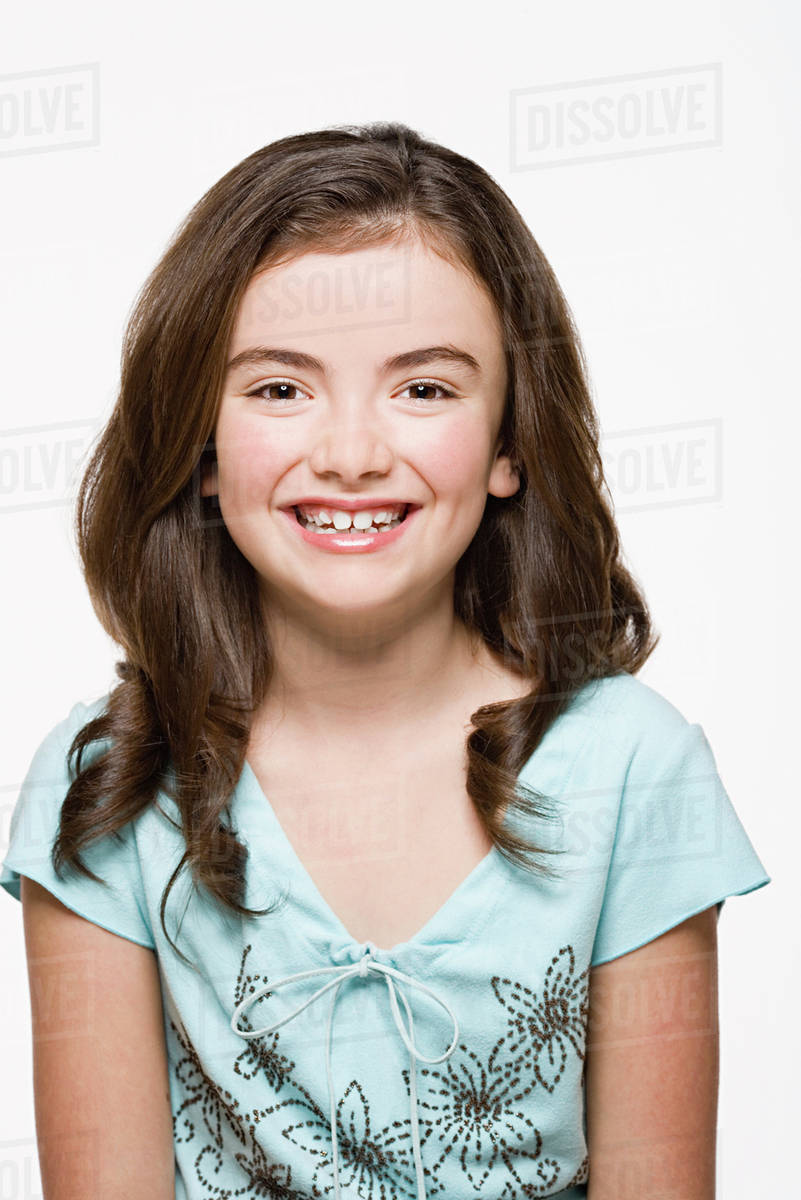 Portrait of smiling girl (8-9), studio shot - Royalty-free Stock Photo ...