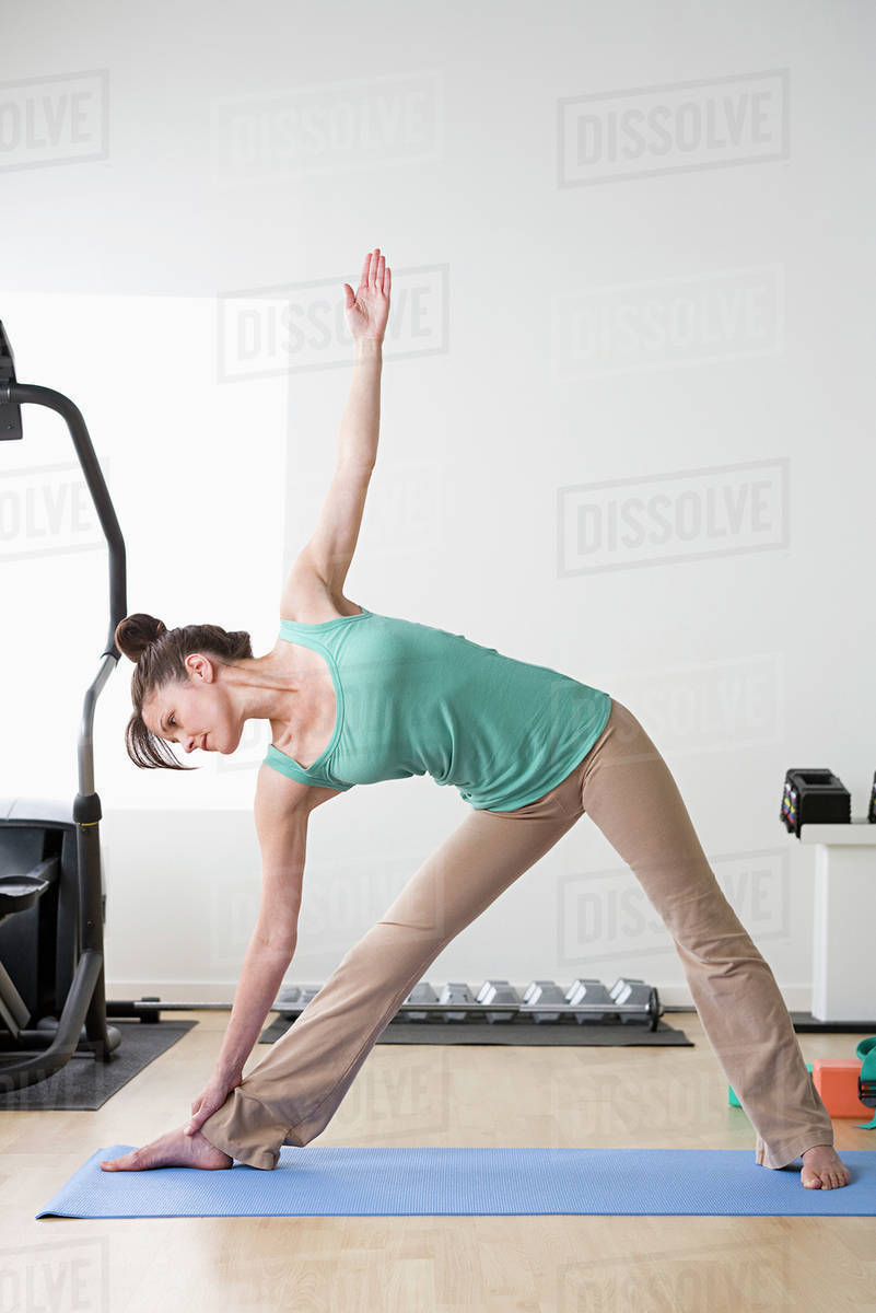 Woman stretching - Royalty-free Stock Photo | Dissolve