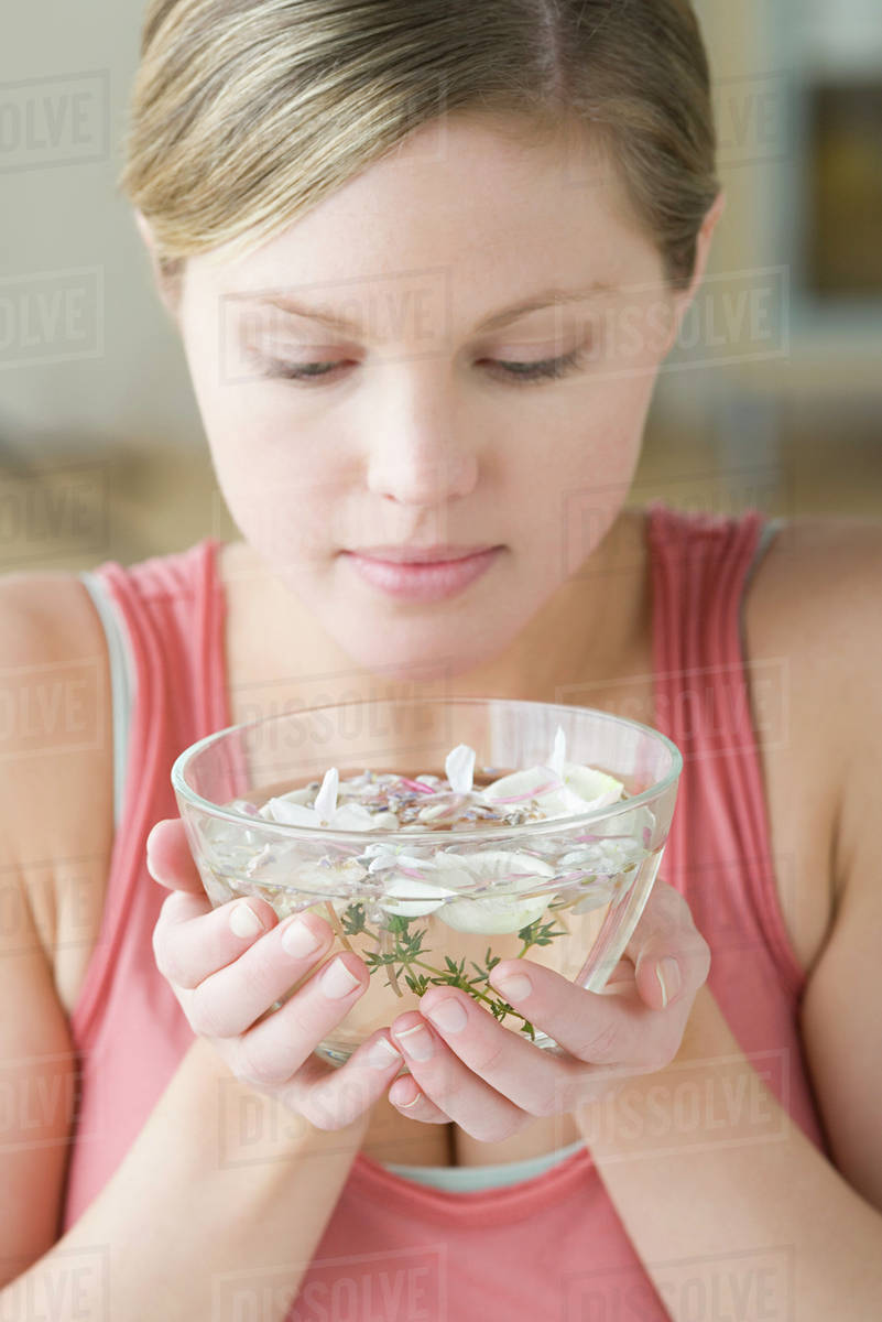 Woman enjoying aromatherapy - Royalty-free Stock Photo | Dissolve