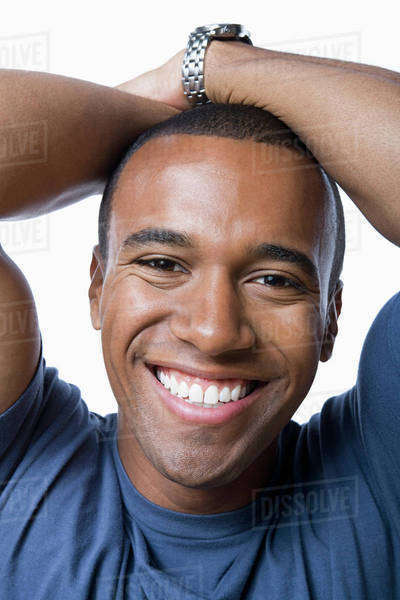 Studio portrait of young man - Royalty-free Stock Photo | Dissolve