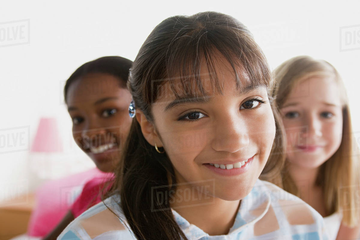Portrait of three girls (10-11) - Stock Photo - Dissolve