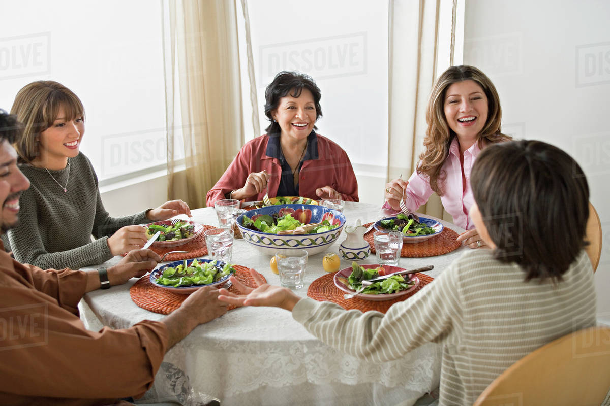 Family having meal together - Royalty-free Stock Photo | Dissolve