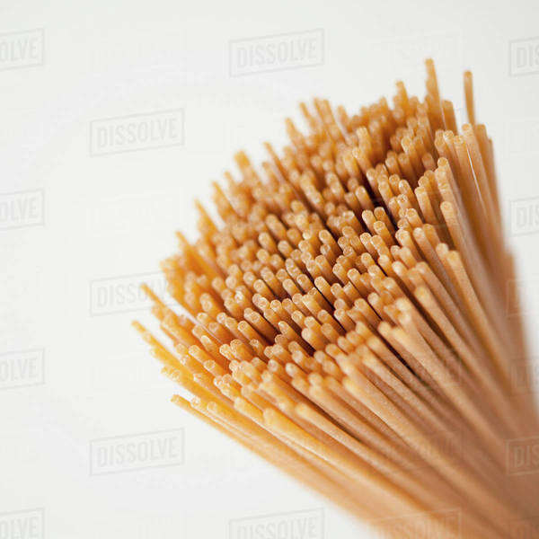 Bunch of dried spaghetti, close-up - Royalty-free Stock Photo | Dissolve