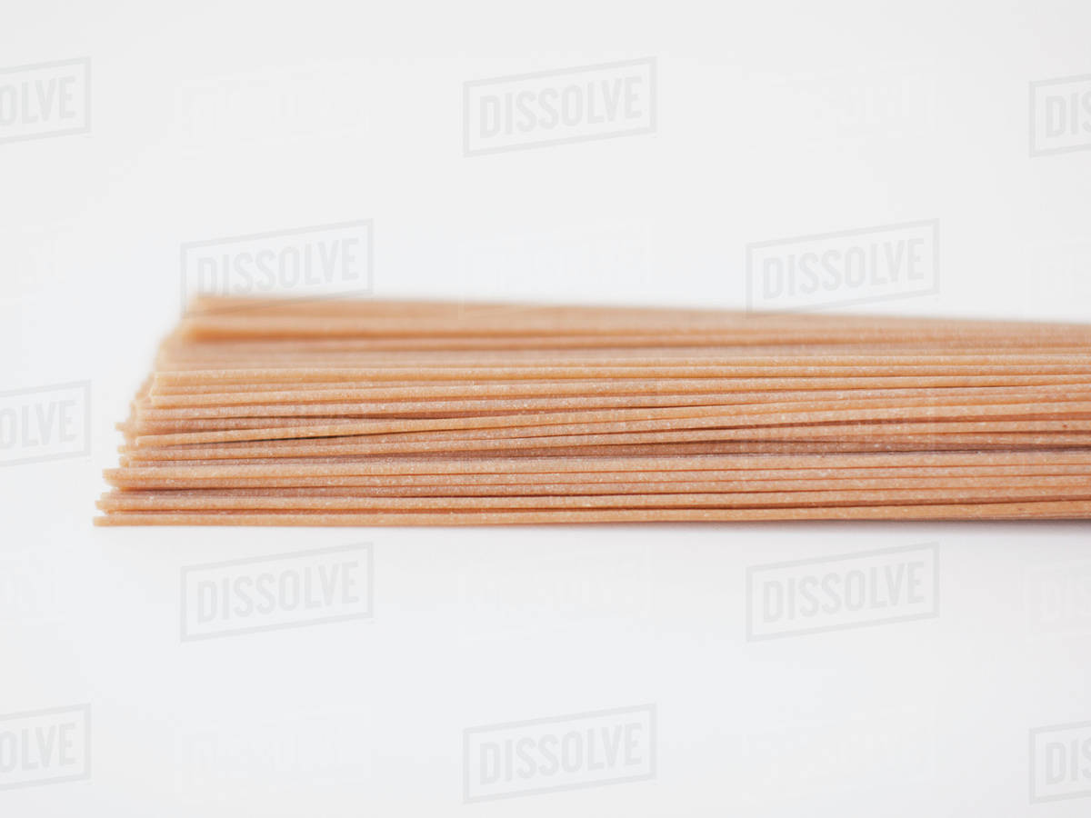 Bunch of dried spaghetti, close-up - Royalty-free Stock Photo | Dissolve