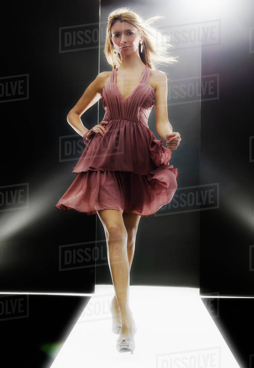 Female fashion model wearing dress on catwalk - Royalty-free Stock ...