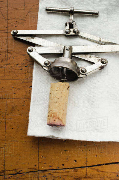 Cork screw bottle opener - Stock Photo - Dissolve