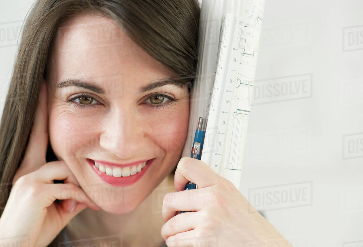 Close-up of woman holding ruler and pencil - Royalty-free Stock Photo ...