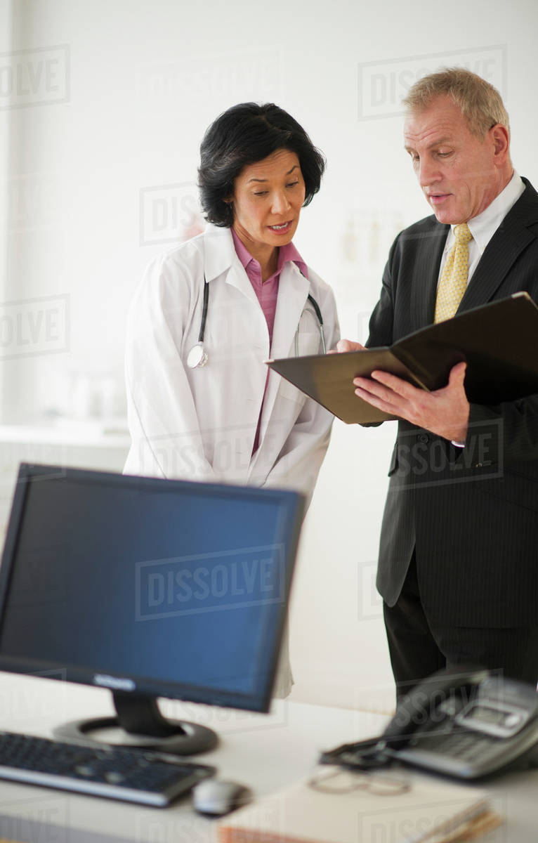 Female doctor s with hospital executive - Royalty-free Stock Photo ...