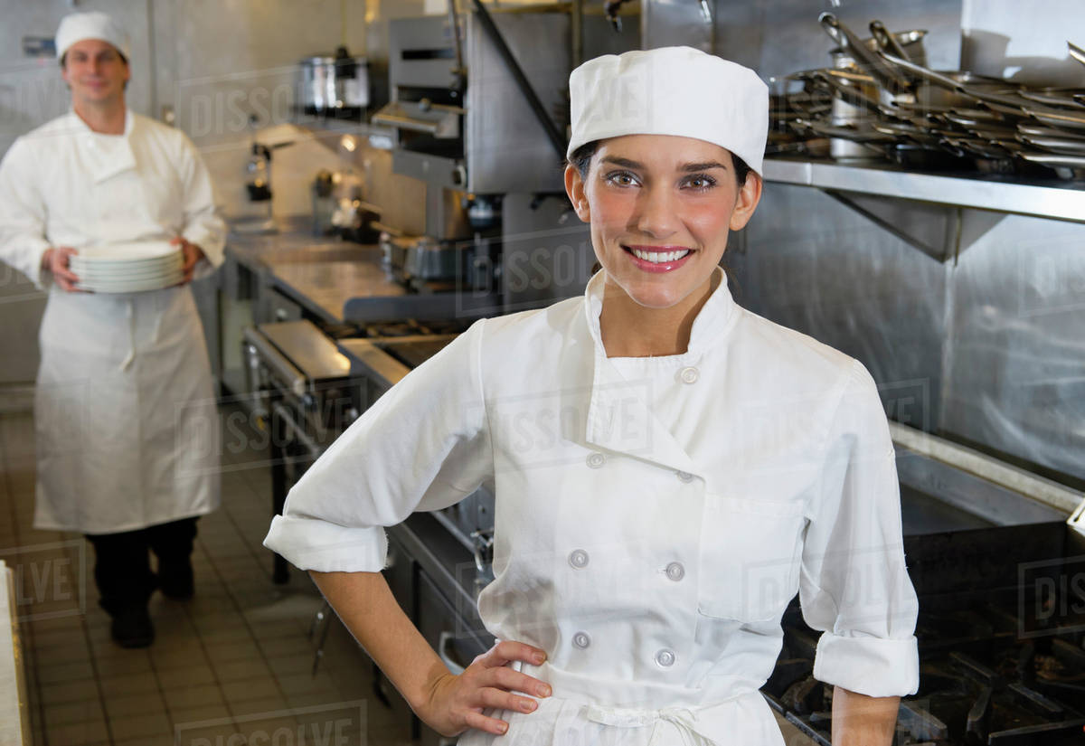 Chef and cook in commercial kitchen - Royalty-free Stock Photo | Dissolve