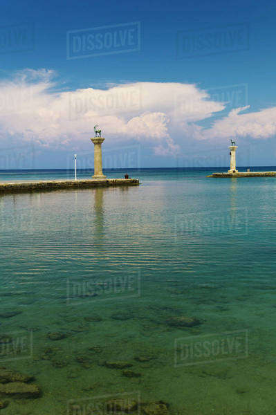 Greece, Rhodes, Deer statue in Mandraki Harbor - Stock Photo - Dissolve