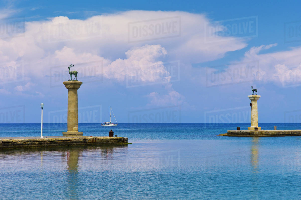 Greece, Rhodes, Deer statue in Mandraki Harbor - Stock Photo - Dissolve