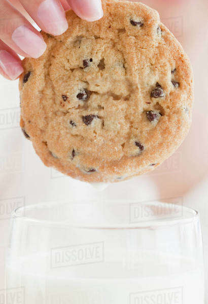 Close up of woman's hand holding cookie - Royalty-free Stock Photo ...