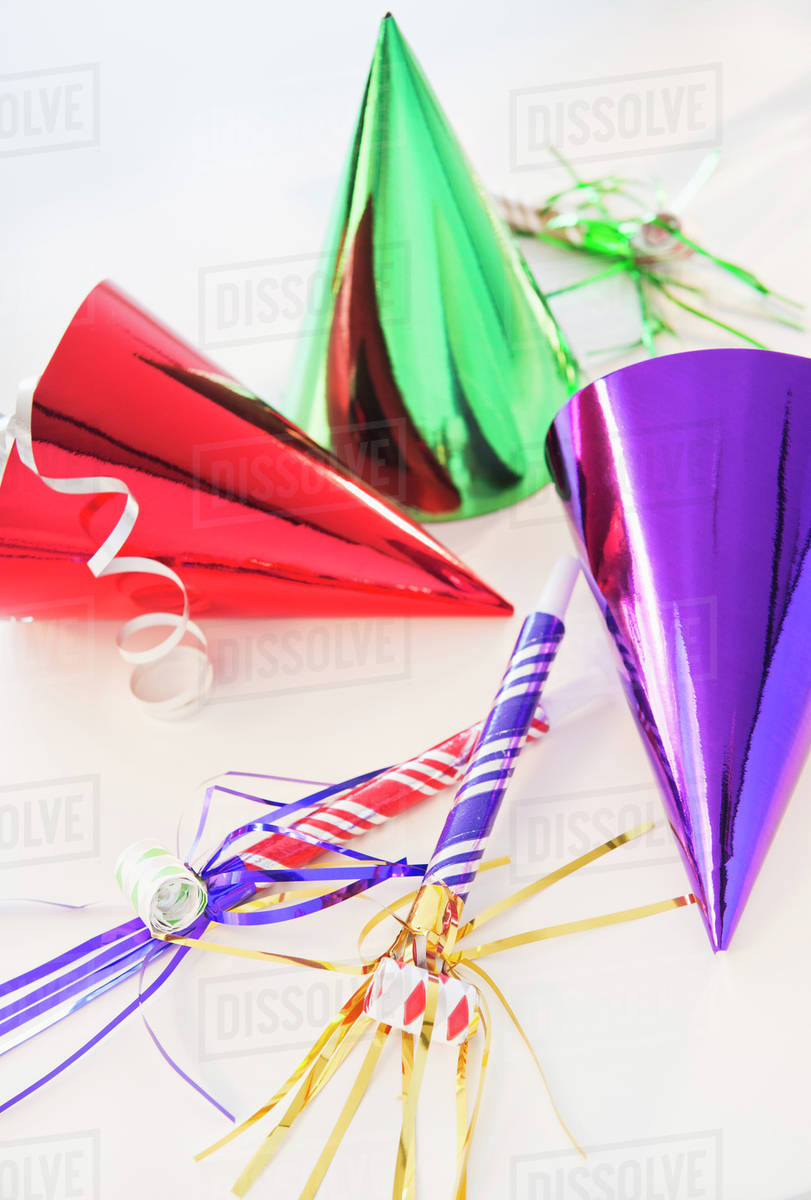 Party horn blowers and paper party hats - Royalty-free Stock Photo ...