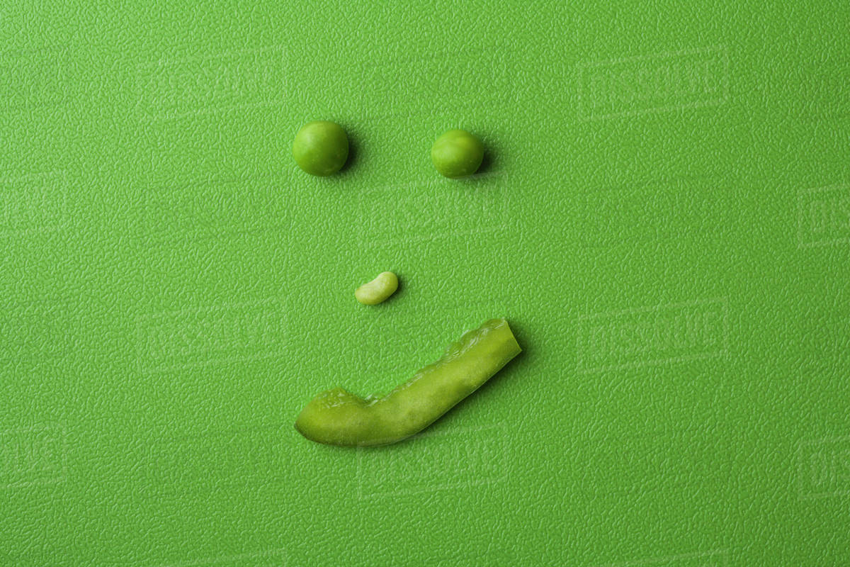 Anthropomorphic face made up from green peas - Royalty-free Stock Photo ...